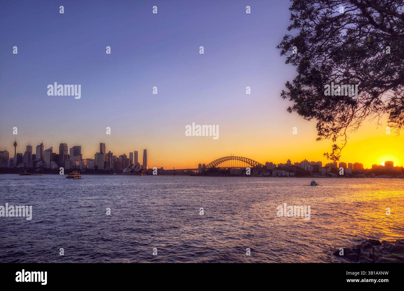 Waterfront of Sydney Harbour - major architecture landmarks at sunset ...