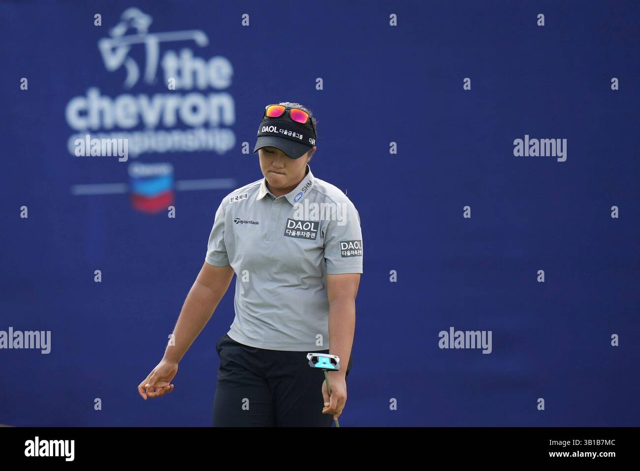 Haeran Ryu, of South Korea, reacts on the 18th hole during the second ...
