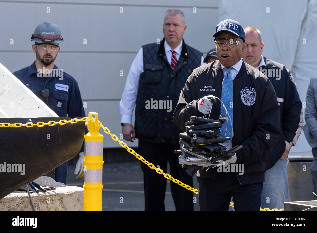 Westbury, USA. 24th Apr, 2025. Mayor Eric Adams helps to destroy ...