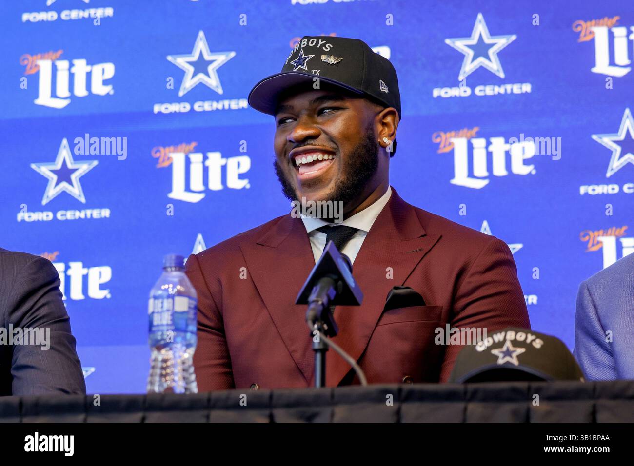 Dallas Cowboys first-round NFL football draft pick Tyler Booker laughs ...