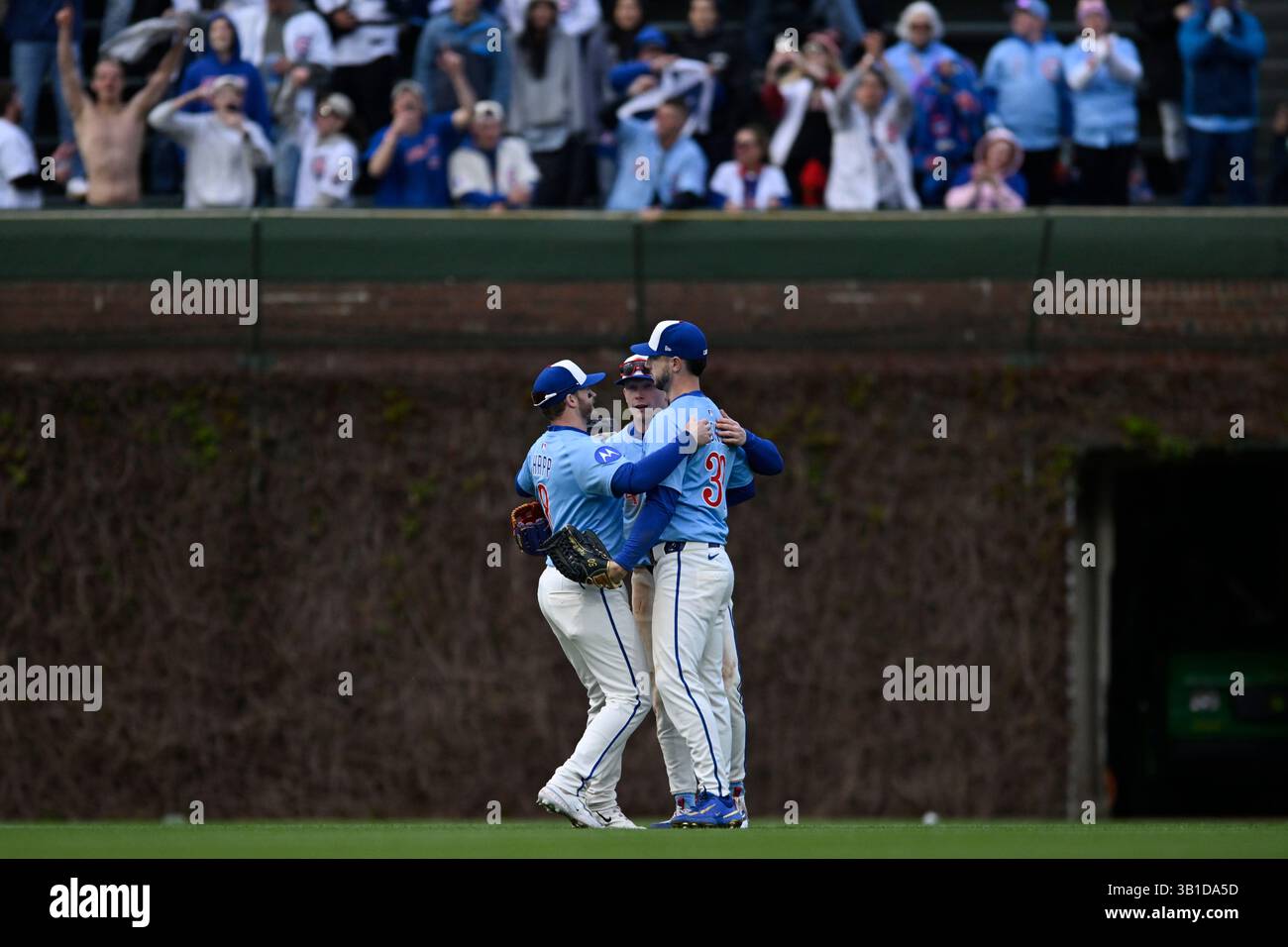 Chicago Cubs outfielders Ian Happ left, Pete Crow-Armstrong, center ...