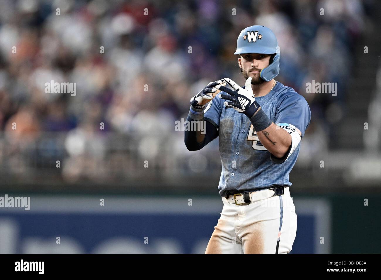 Washington Nationals' Dylan Crews gestures after hitting a double off New York Mets pitcher ...