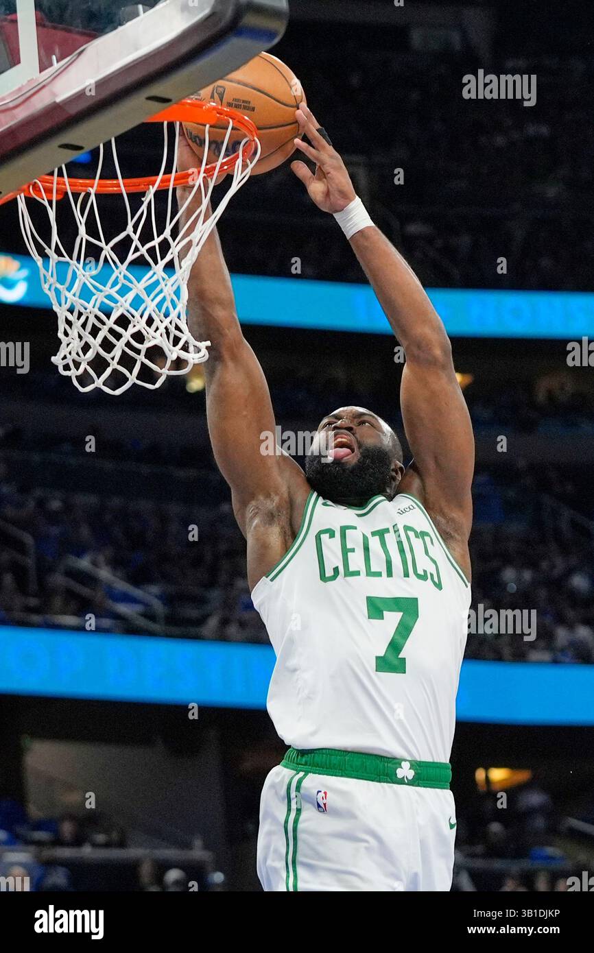 Boston Celtics guard Jaylen Brown (7) makes an uncontested dunk against ...