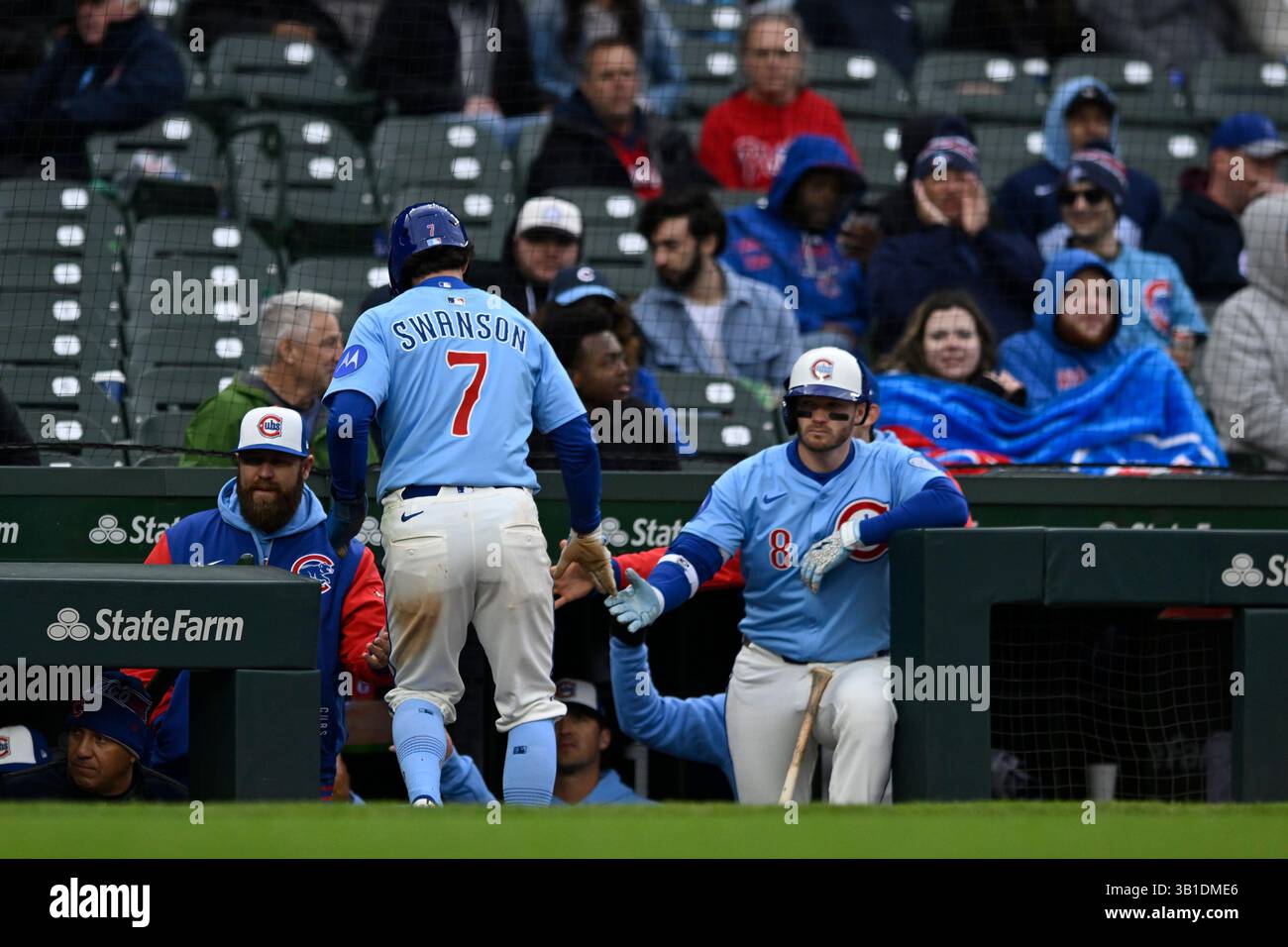 Chicago Cubs' Darby Swanson (7) celebrates with teammate Ian Happ (8 ...