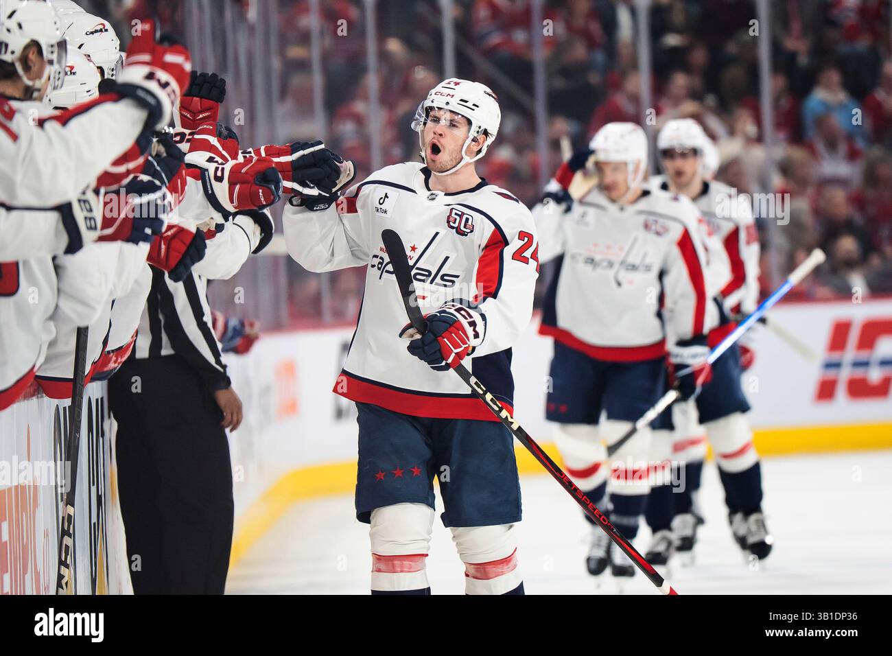 Washington Capitals' Connor McMichael (24) celebrates with teammates ...