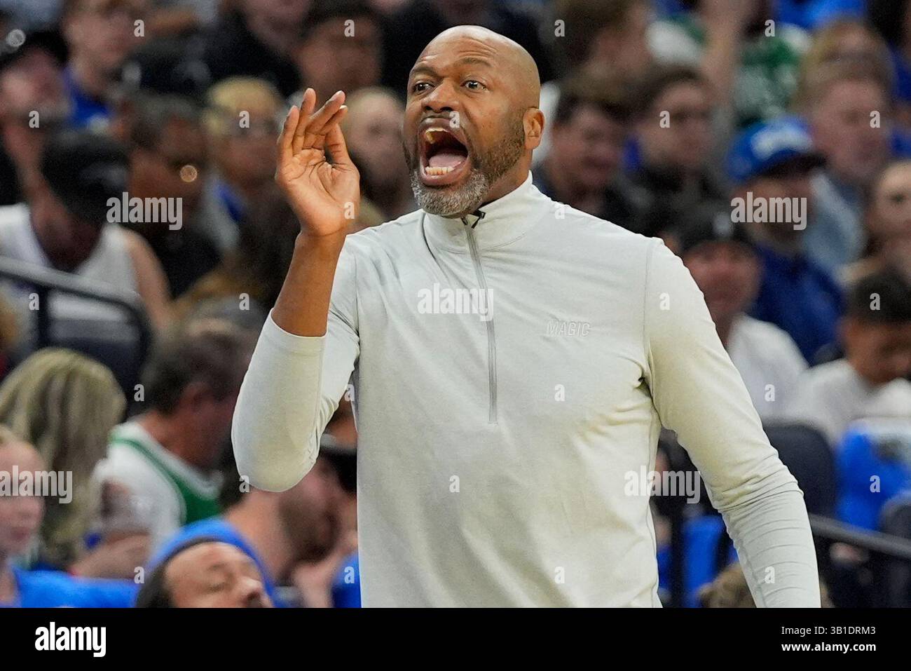 Orlando Magic head coach Jamahl Mosley shouts to players on the court ...