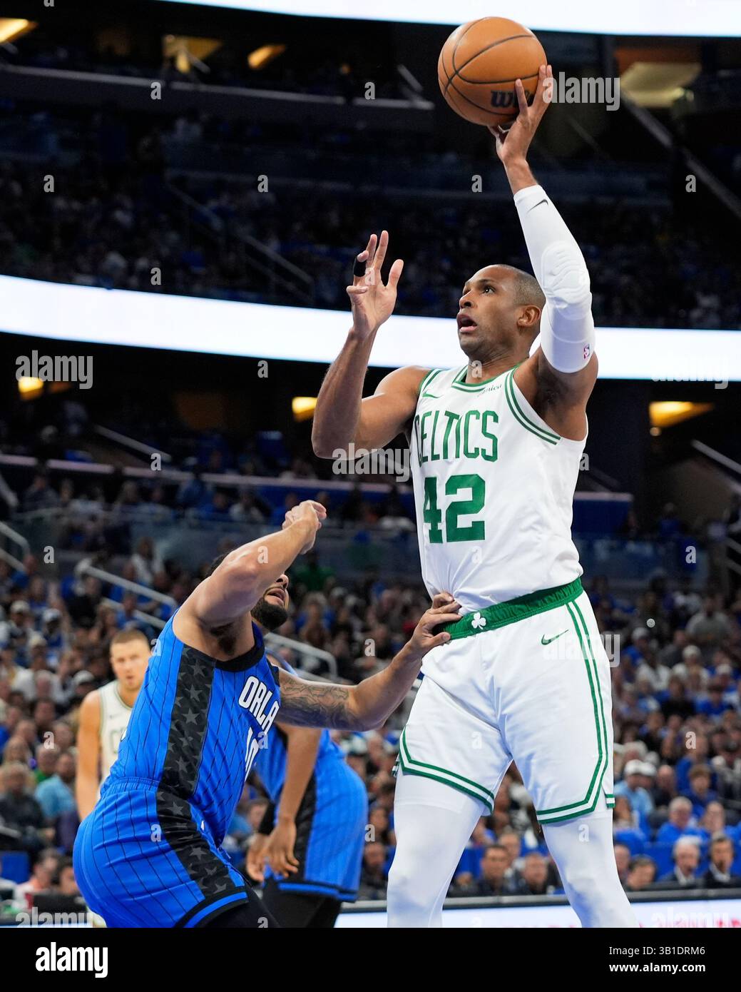 Boston Celtics center Al Horford (42) shoots over Orlando Magic guard ...