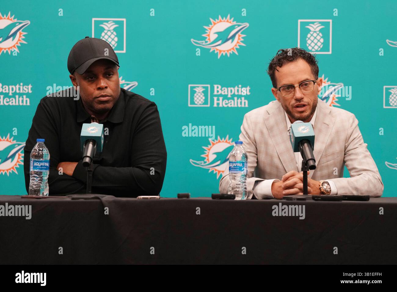 Miami Dolphins general manager, Chris Grier, left, and head coach Mike ...