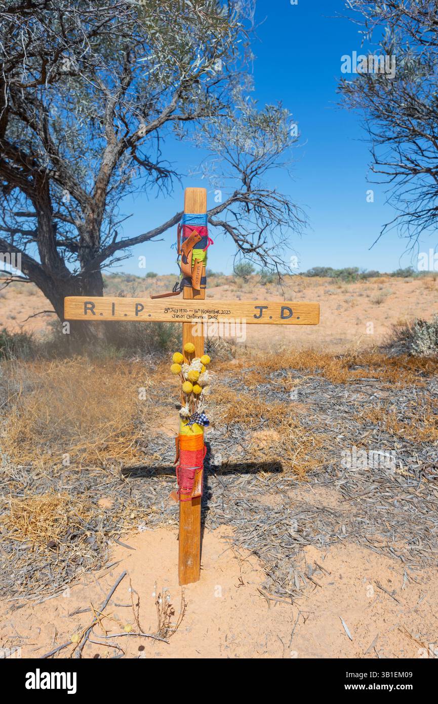 Wooden cross as a memorial to Jason Christopher Doig , a policeman ...