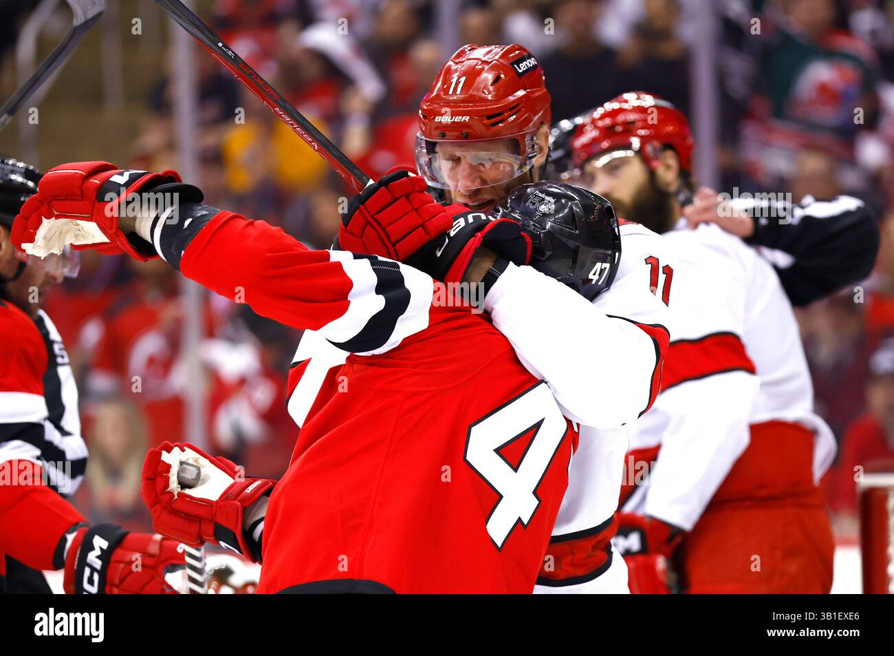 Carolina Hurricanes center Jordan Staal (11) puts New Jersey Devils ...