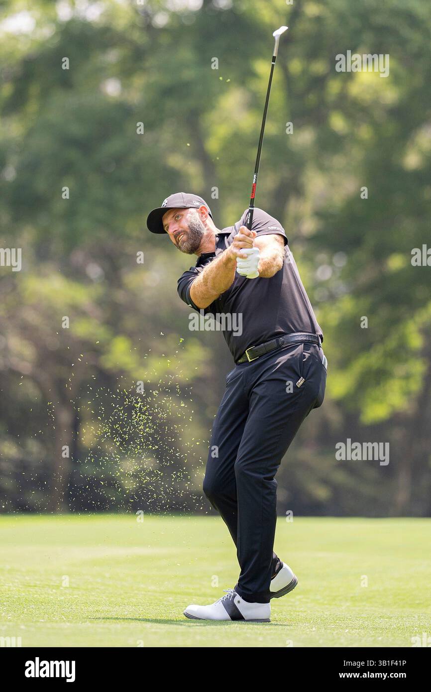 Captain Dustin Johnson of 4Aces GC hits his shot on the 11th hole ...