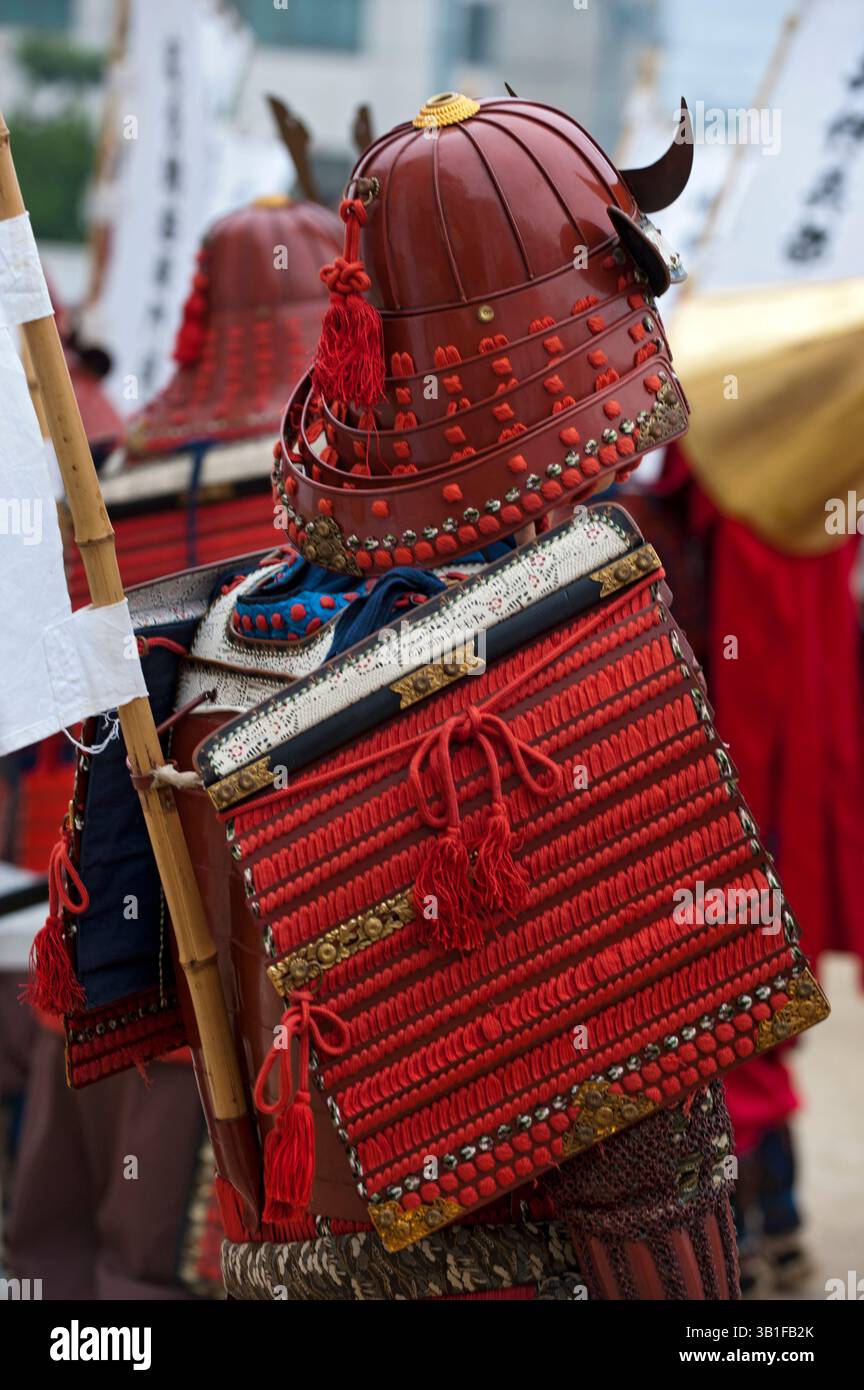 Samurai warriors in full armor costume with kabuto helmets participate ...