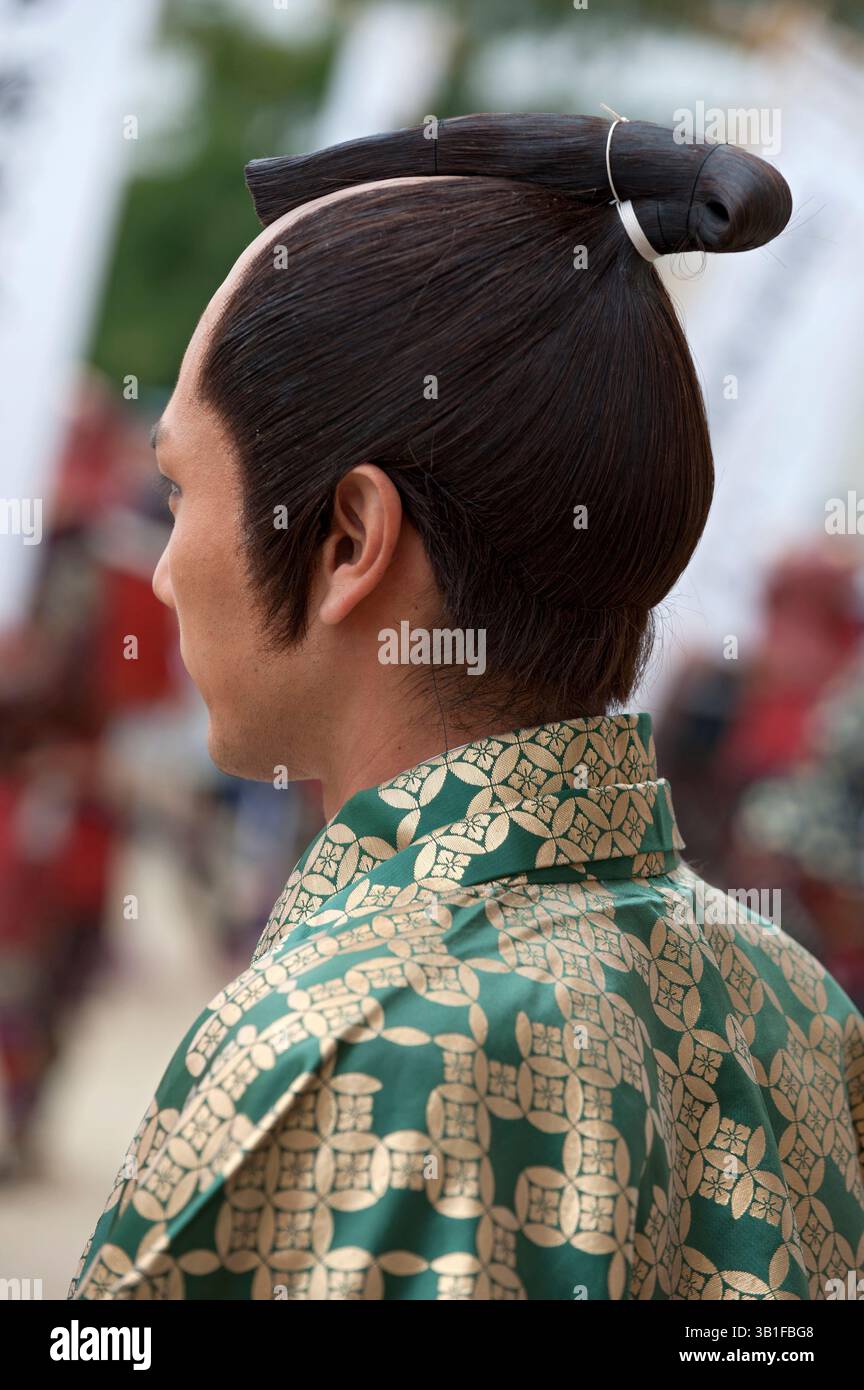 High-level samurai wearing the traditional chonmage (topknot) hairstyle ...