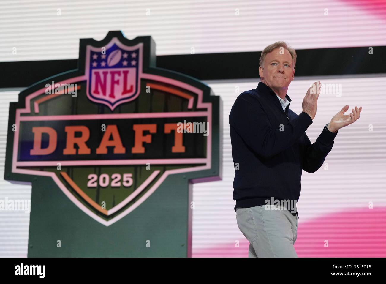 NFL Commissioner Roger Goodell motions on stage during the second round ...