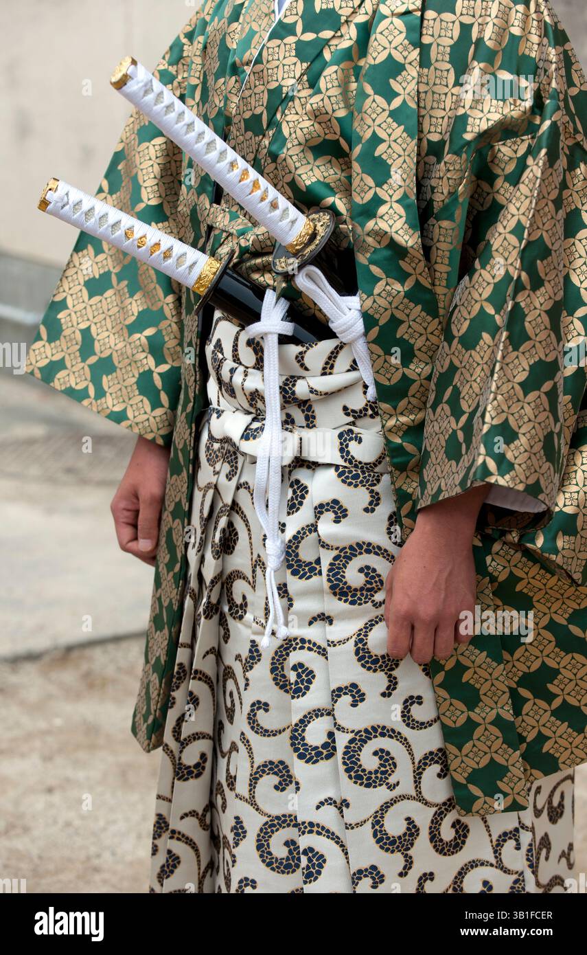 Samurai wearing a kimono and carrying "daisho" (dual swords), a katana ...
