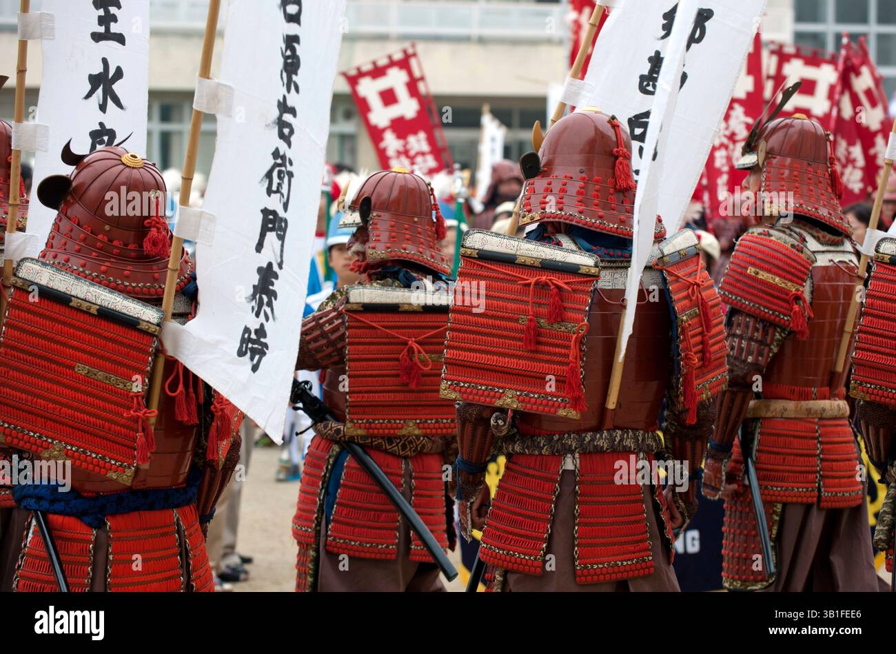 Samurai warriors in full armor costume with kabuto helmets participate ...