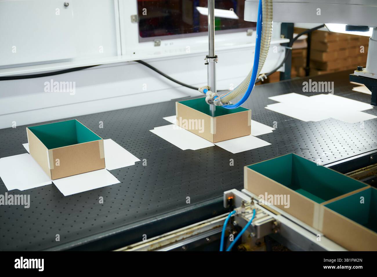 Innovative robotic technology automates the gluing process in cardboard ...