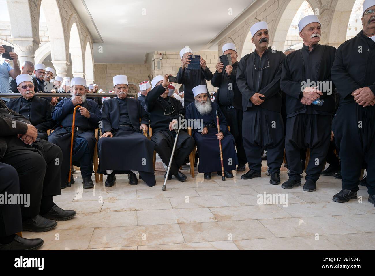 Druze clerics sit before the main prayer at the shrine of Prophet Shu ...