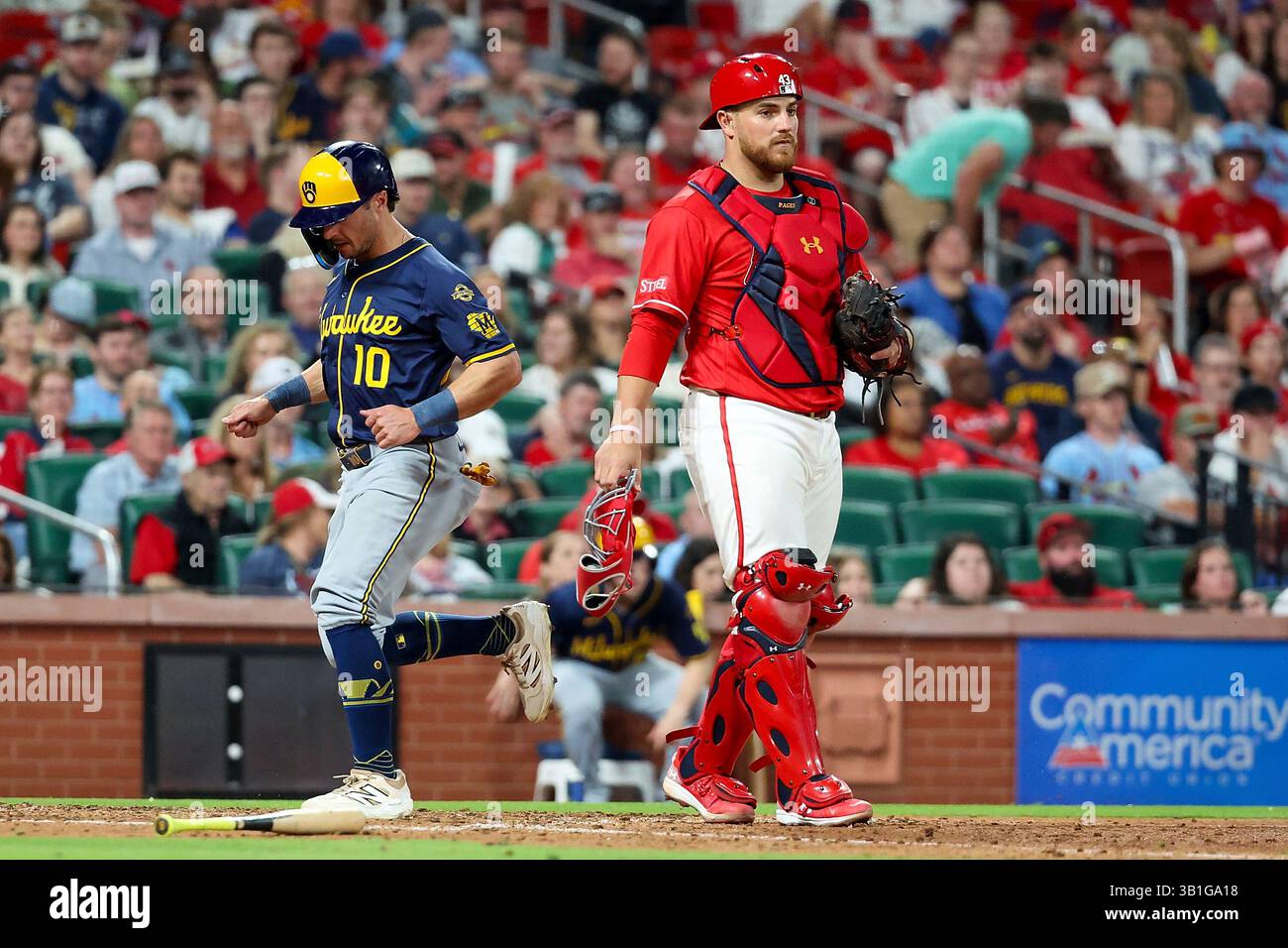 St. Louis Cardinals catcher Pedro Pagés, right, looks on as Milwaukee ...