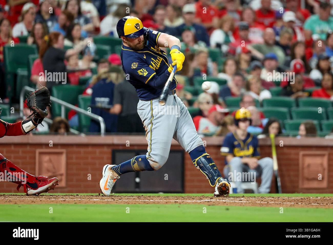 Milwaukee Brewers' Rhys Hoskins hits a single during the seventh inning ...