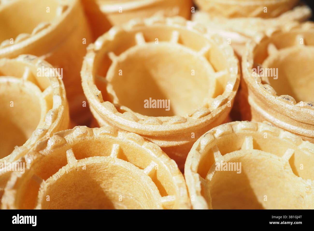 Waffle cones stacked in a bakery ready for filling with ice cream Stock ...