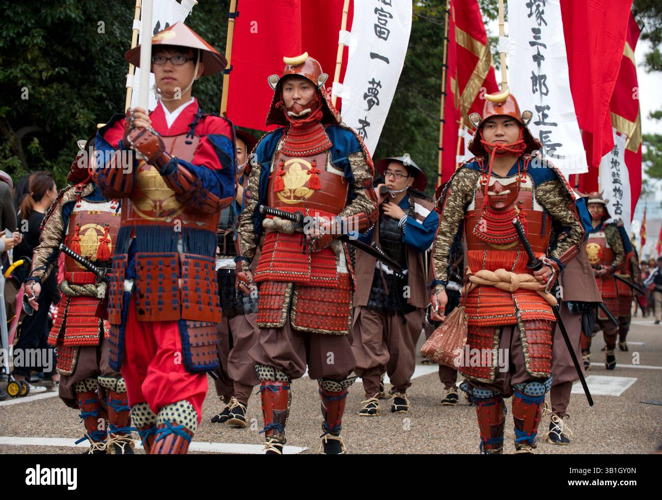 Samurai warriors in full armor costume with kabuto helmets participate ...