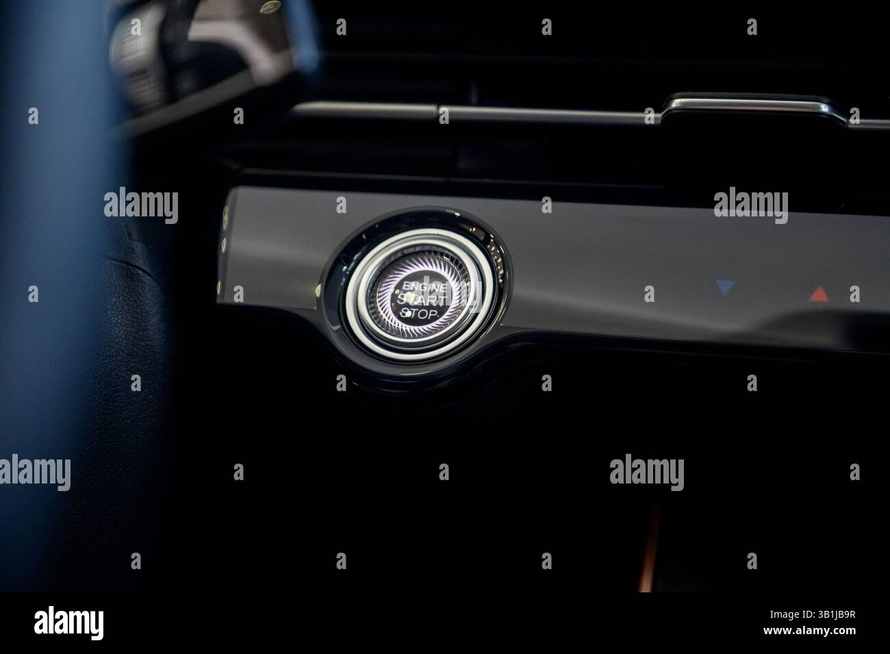 Car engine start button. Car interior. Car electronics. Modern cars ...