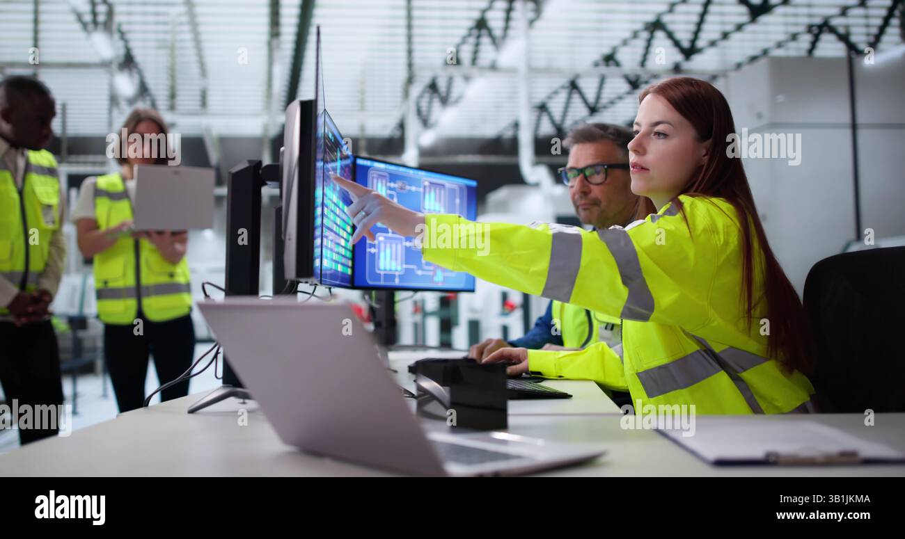 Engineer Operator Monitors SCADA System At Industrial Plant With ...