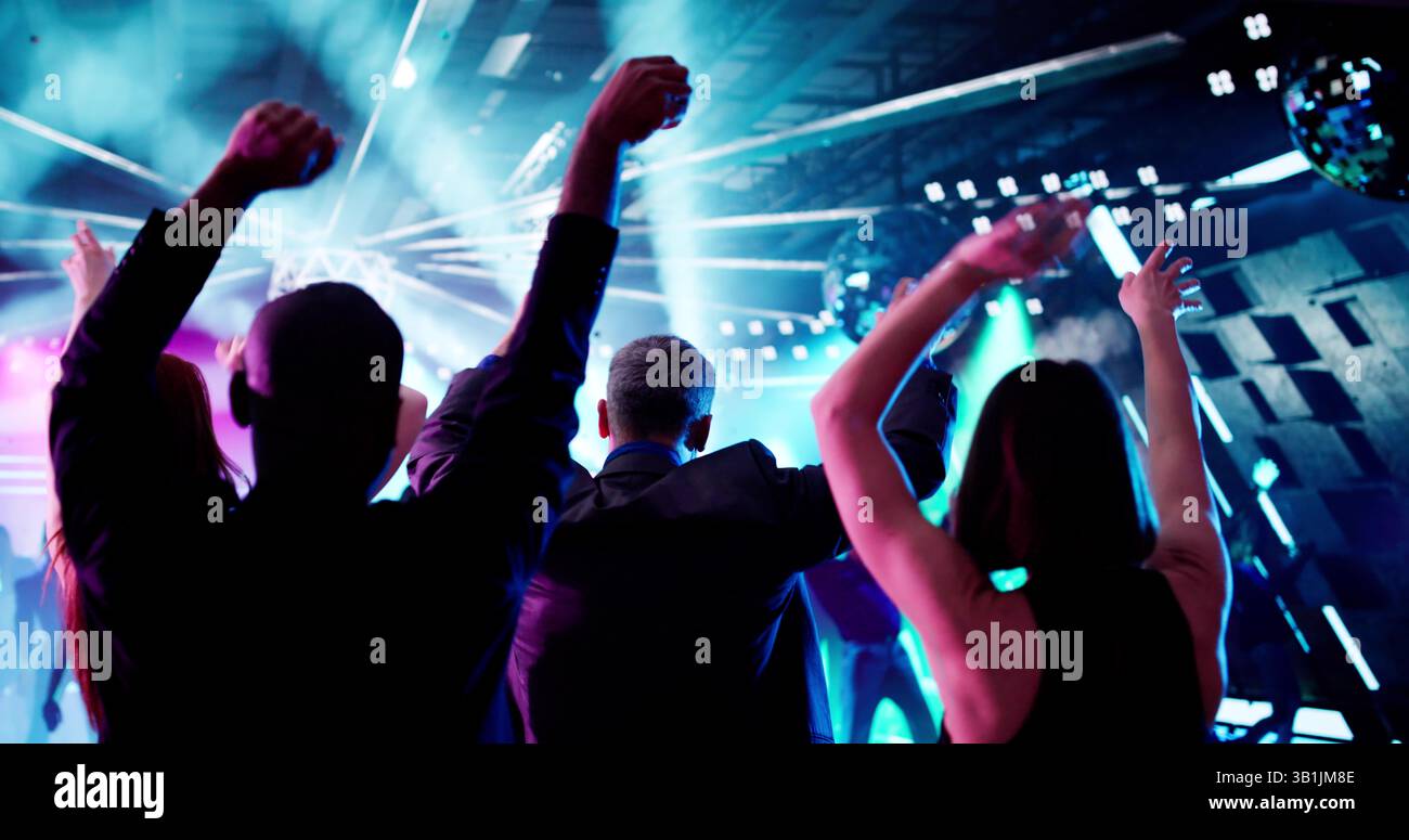 The Nightclub Dancer: A Diverse Group Silhouetted In Motion Stock Photo ...