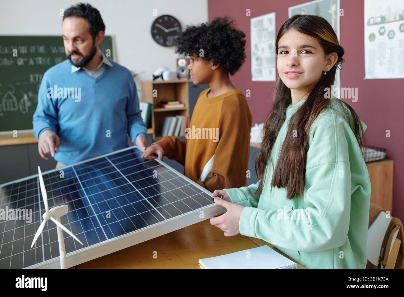 Diverse Students Learning About Solar Panels and Wind Turbines Stock ...