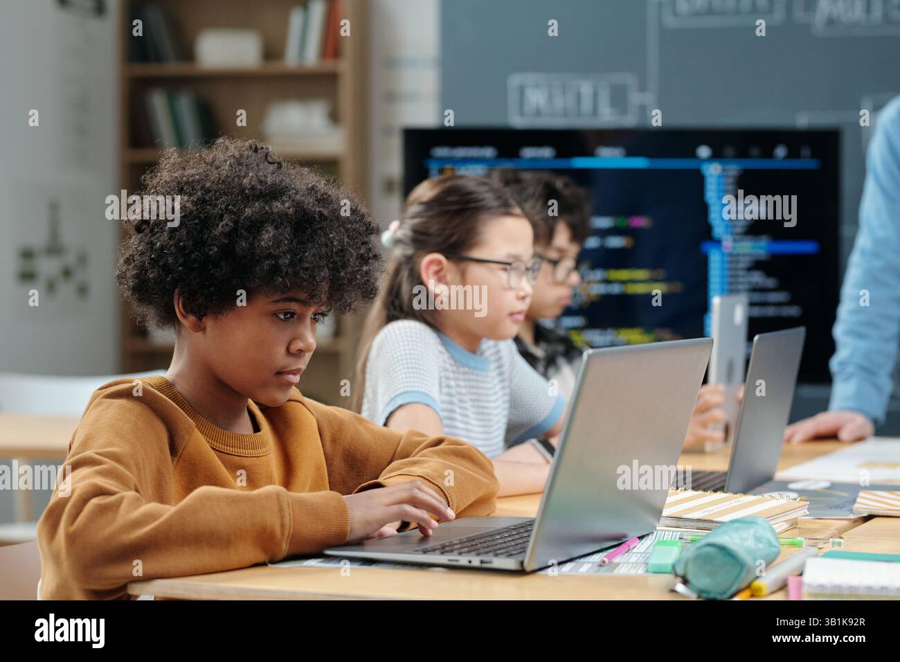 Engaging Students Participating in Digital Class Activities Stock Photo - Alamy
