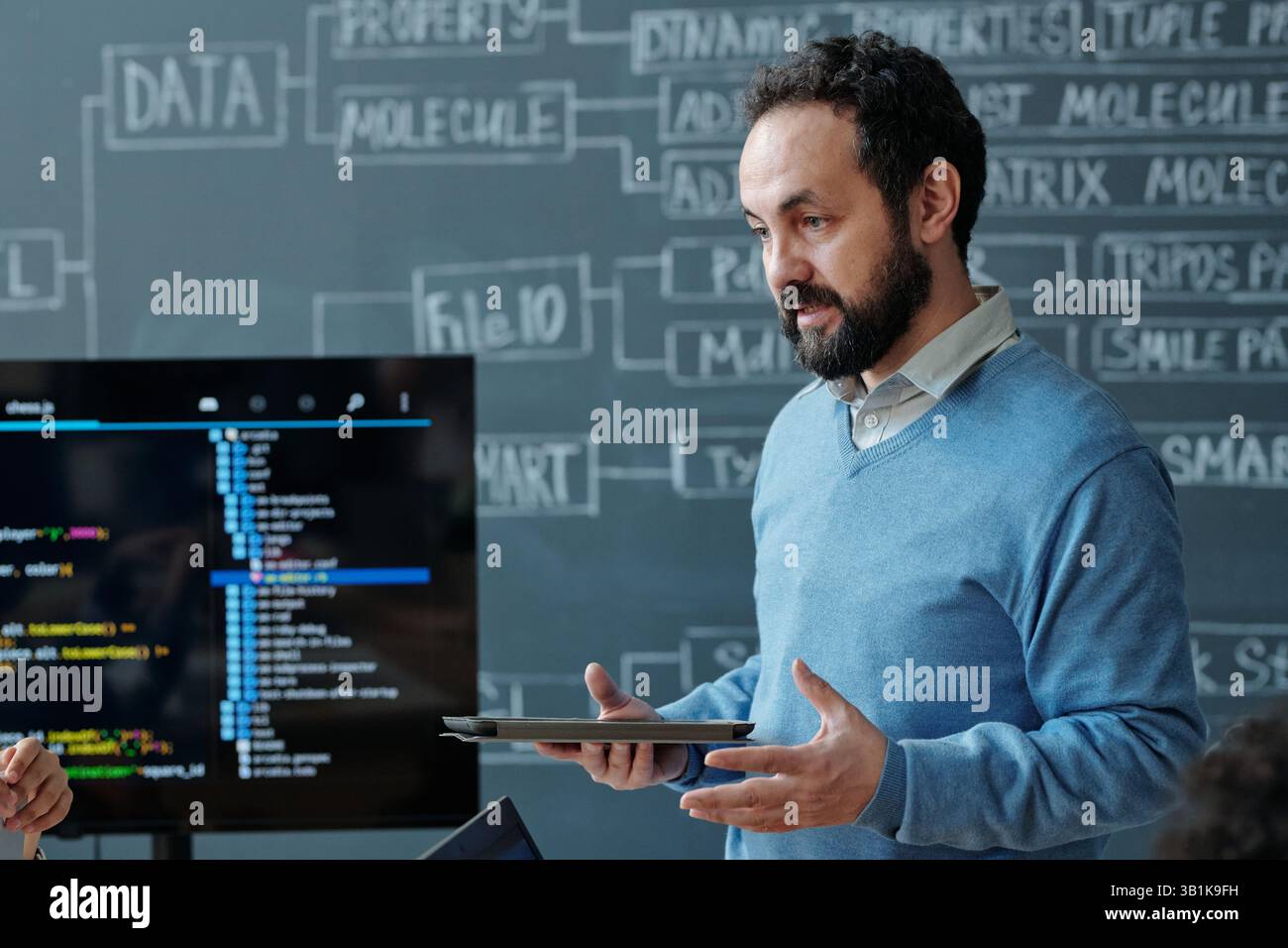 Explaining Coding Concepts During Classroom Session Stock Photo - Alamy