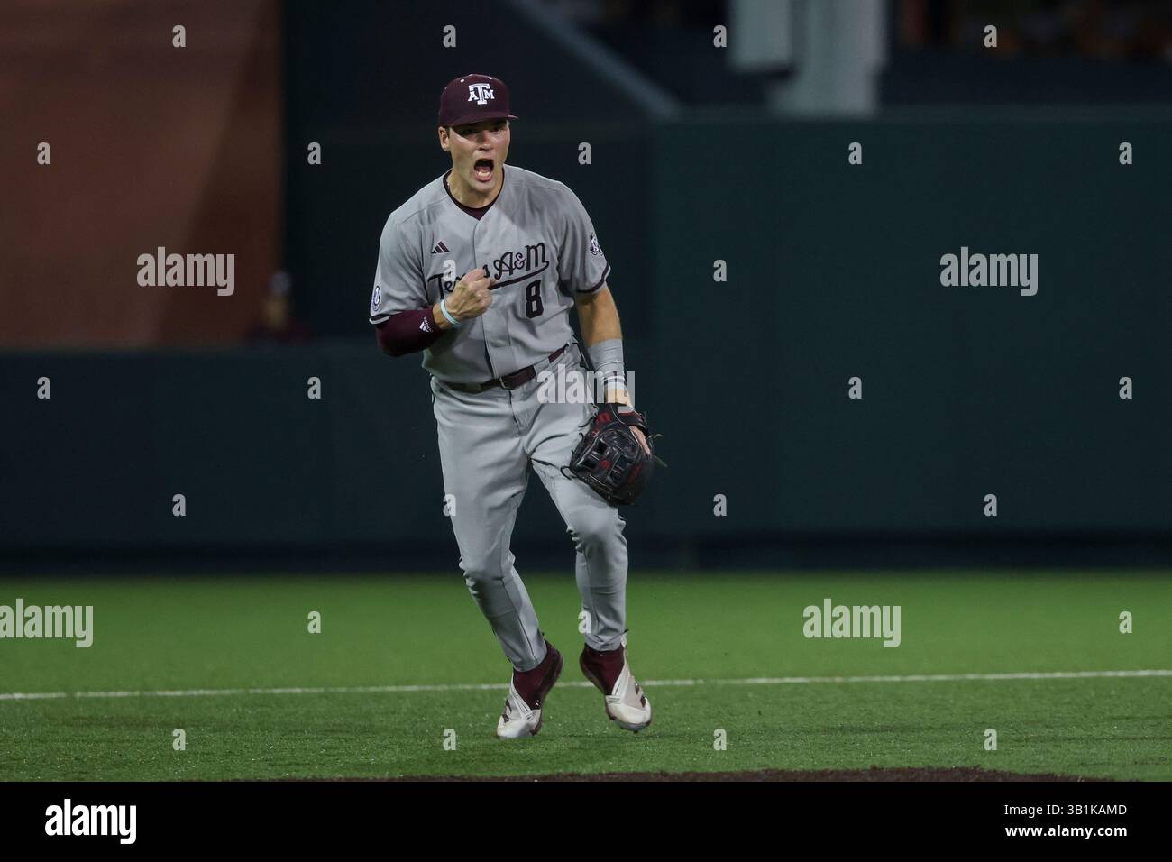 AUSTIN, TX - APRIL 25: Texas A&M third baseman Wyatt Henseler (8) pumps ...