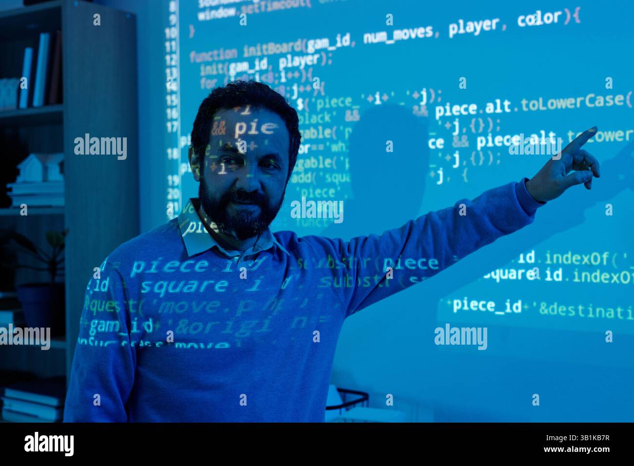 Engineer Creating Code with Projected Computer Screen Stock Photo - Alamy