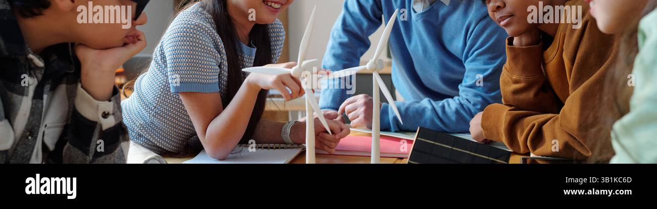 Students Collaborating on a Science Project in Classroom Stock Photo ...