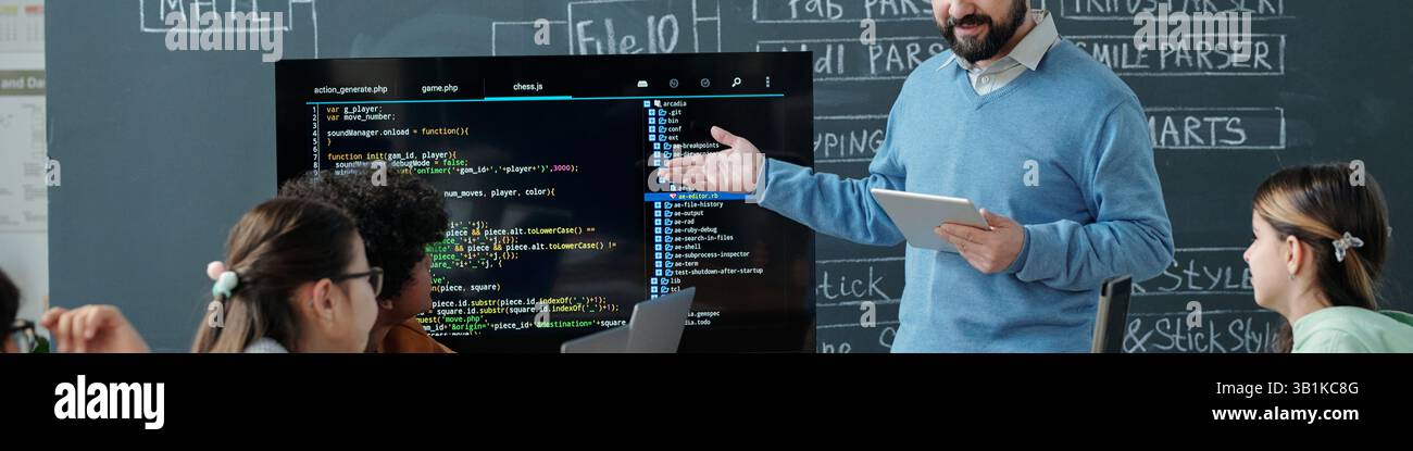 Teaching Programming Code in Classroom Setting Stock Photo - Alamy