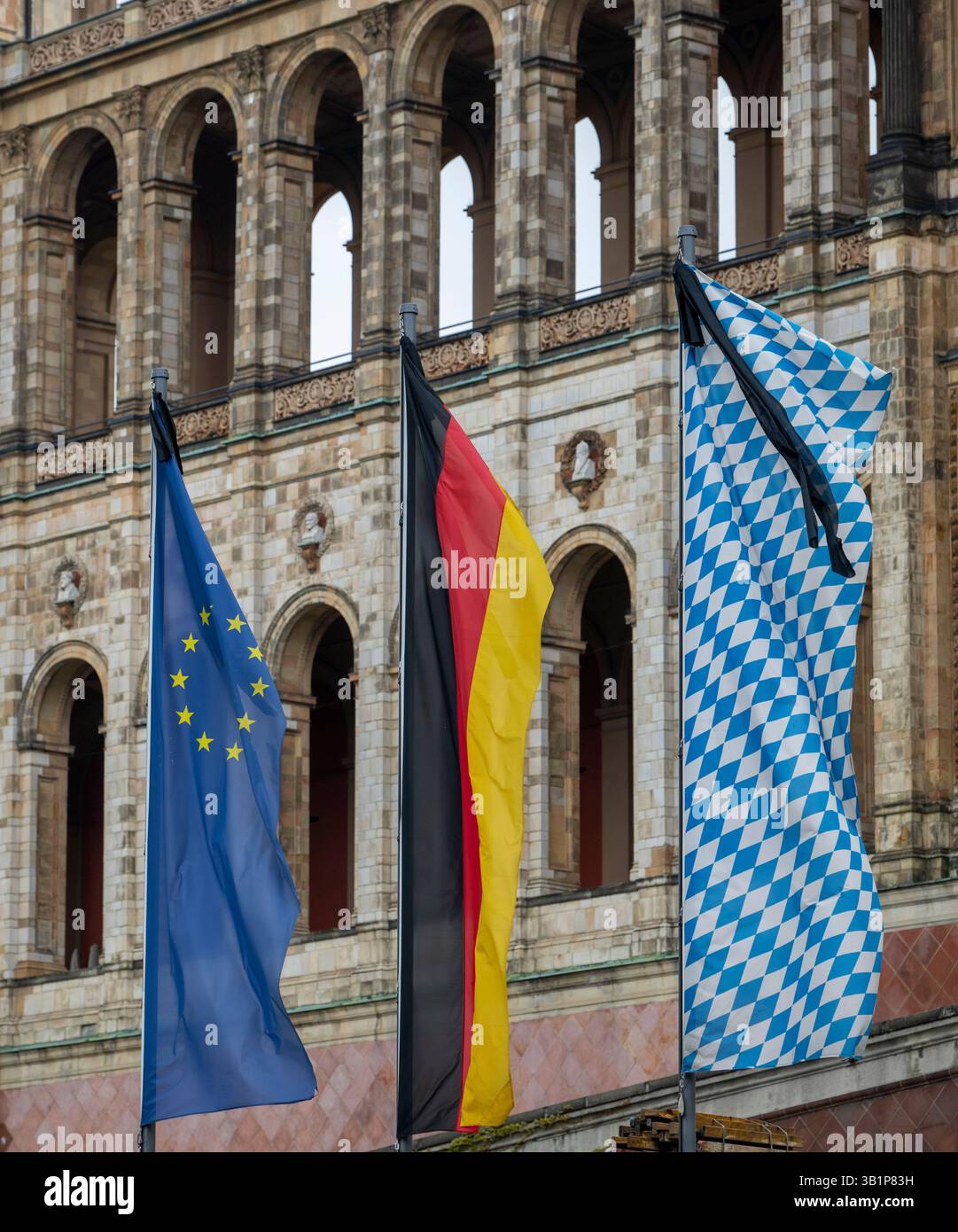 Munich, Germany. 26th Apr, 2025. Flags with mourning flags fly in front ...