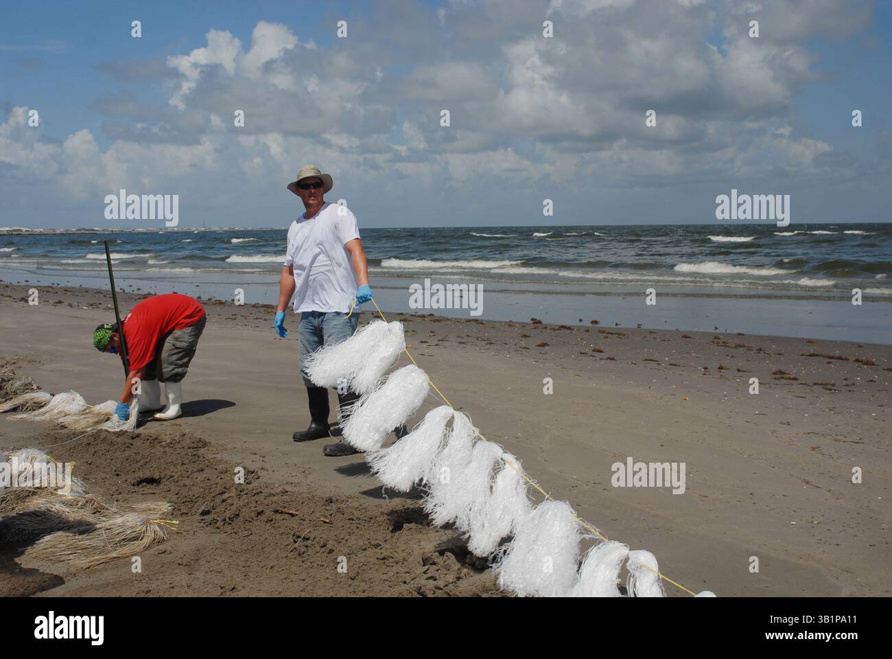 Jul 20, 2010 - Elmer's Island, Louisiana, U.S. - BP clean up crews lay ...