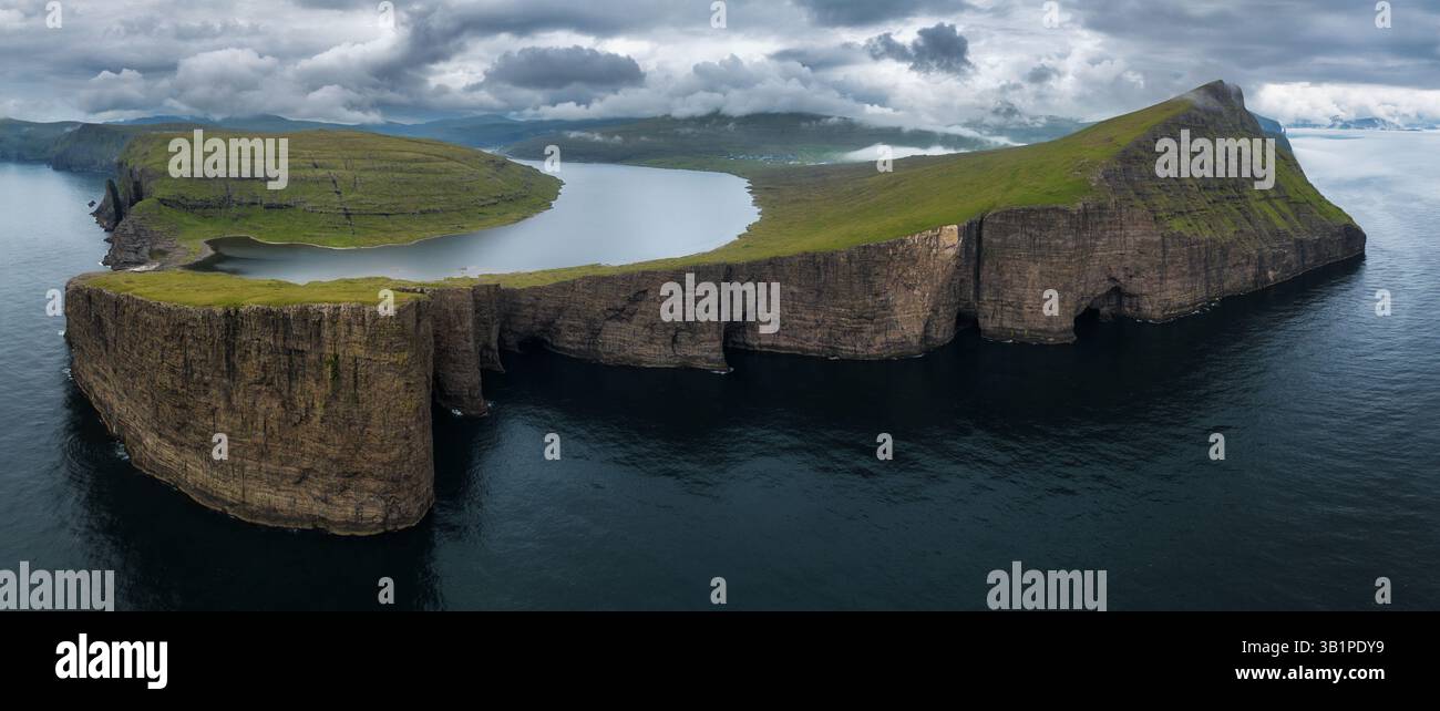 Drone Panorama of Sorvagsvatn lake and cliffs of Traelanipa on Vagar island in sunset, Faroe ...