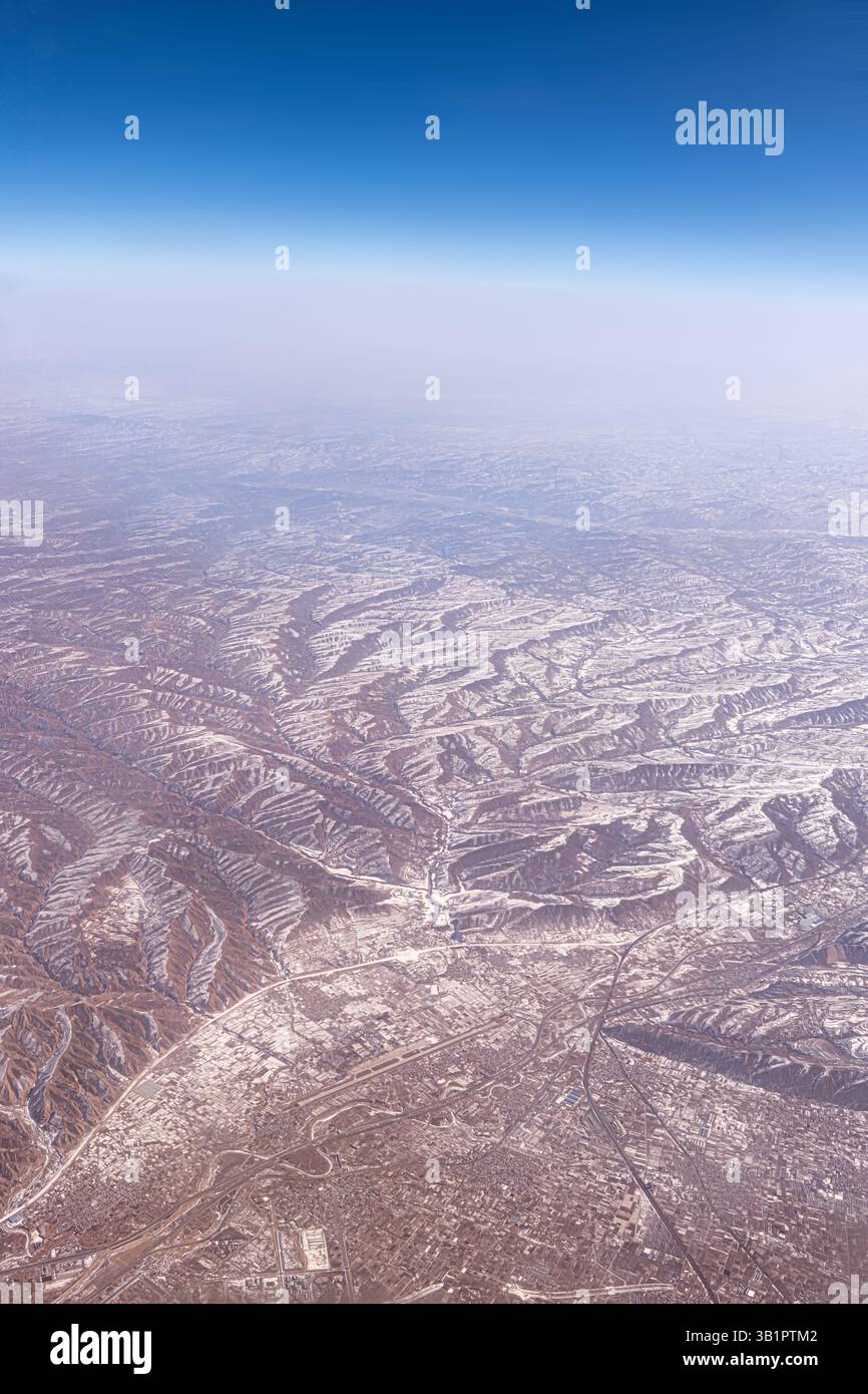 Mountain Ranges and Shanxi Province in China airplane view. Inner ...