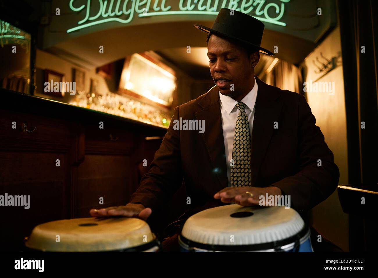 Black man playing congas hi-res stock photography and images - Alamy