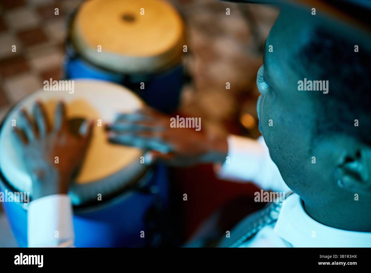 Black man playing congas hi-res stock photography and images - Alamy