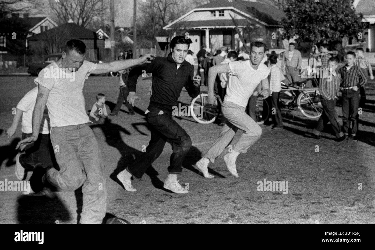 Dec. 27, 1956 - Memphis, TN, U.S. - Elvis Presley playing touch ...