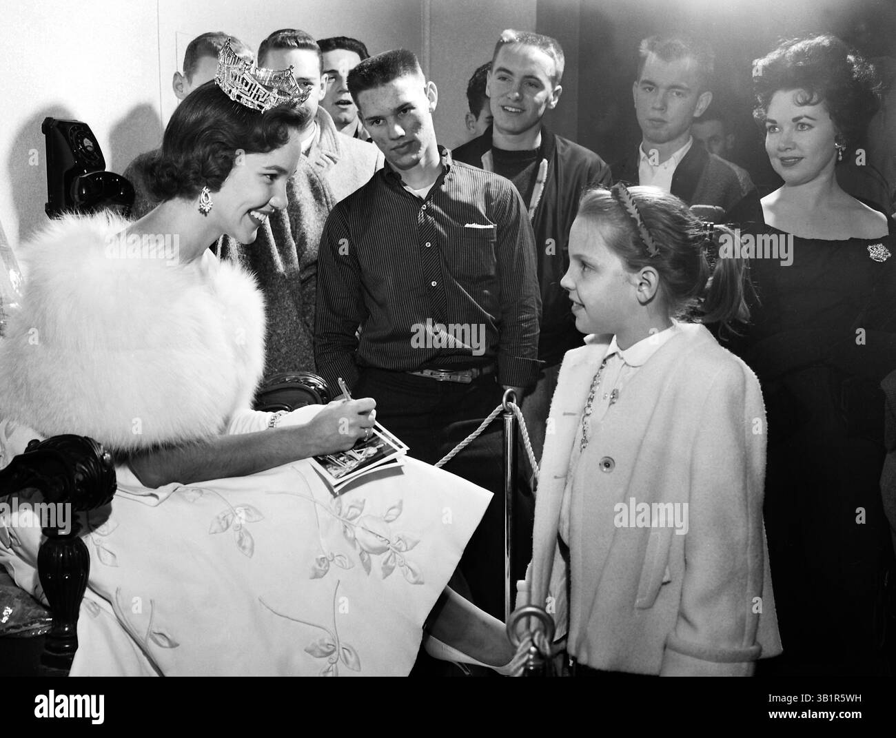 Jan. 11, 1959 - Memphis, TN, U.S. - Autographing pictures of herself ...