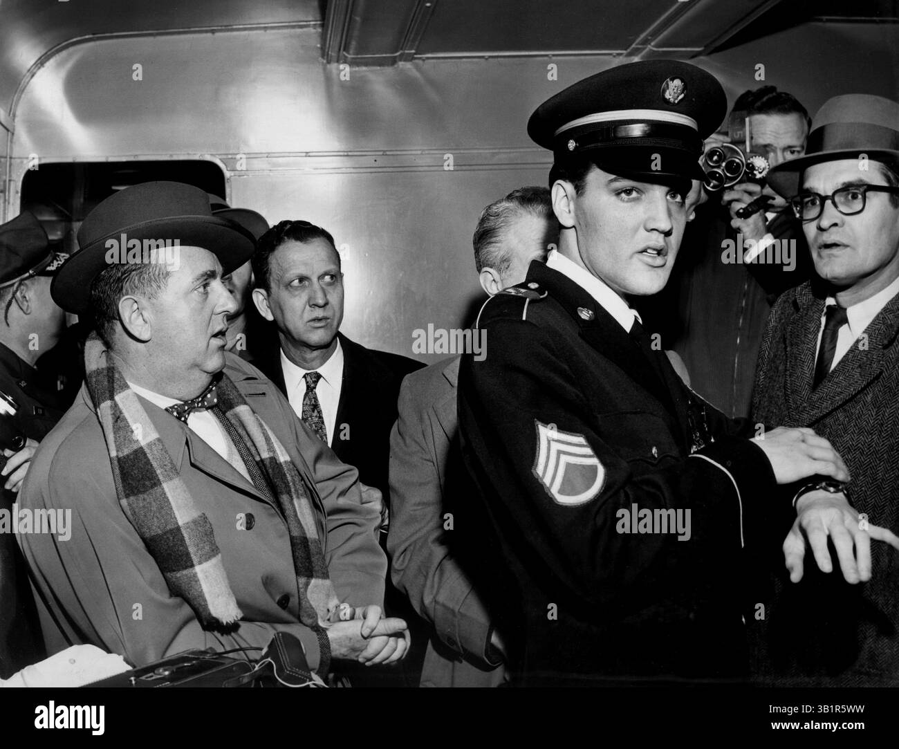 Mar. 7, 1960 - Memphis, TN, U.S. - Elvis Presley aboard the train that brought him home to ...