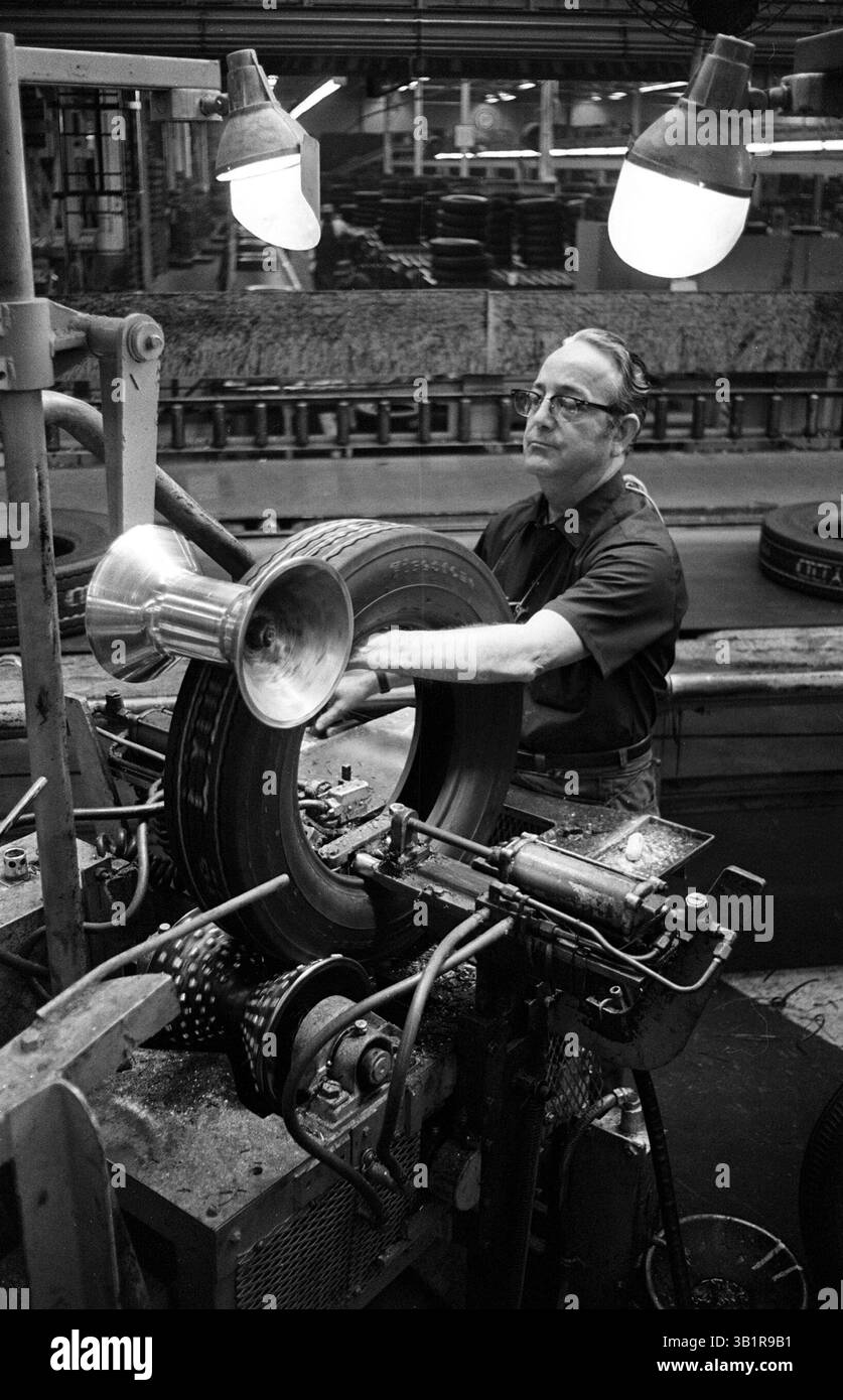 Dec. 1, 1972 - Memphis, TN, U.S. - An inspector checks tires coming off ...