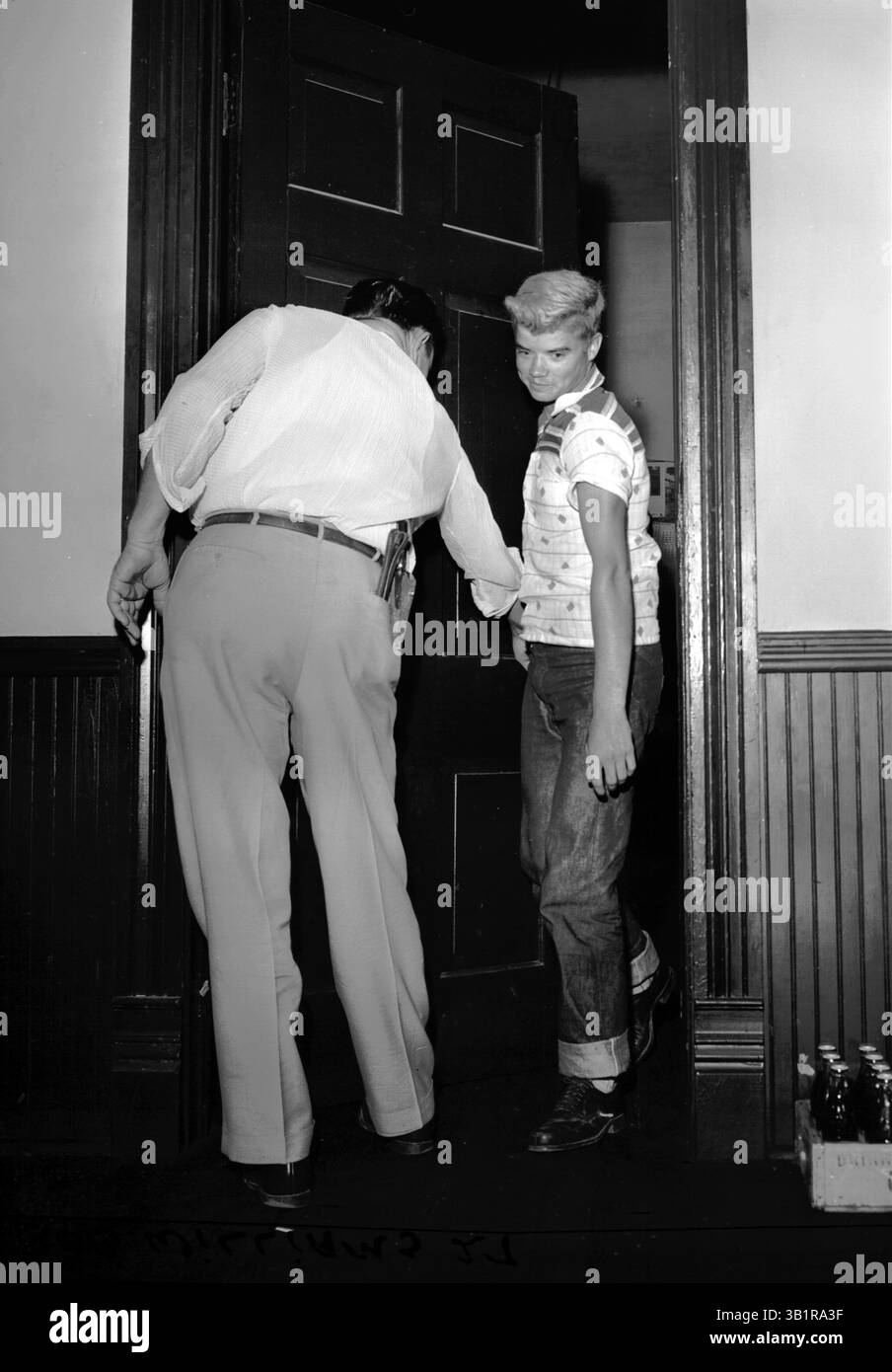 Jan. 1, 2003 - Sumner, MS, U.S. - (Sept. 1955) Robert Hodges is led ...