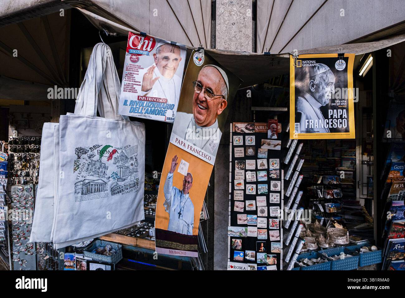 Vatican City, Vatican. 25th Apr, 2025. Posters of Pope Francis hang in ...
