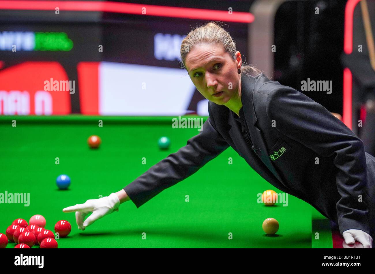 Referee Tatiana Woollaston positioning the balls during 2nd Round match ...