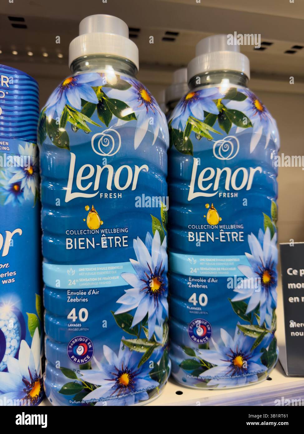 Beautifully designed fabric softeners on display create an inviting ...